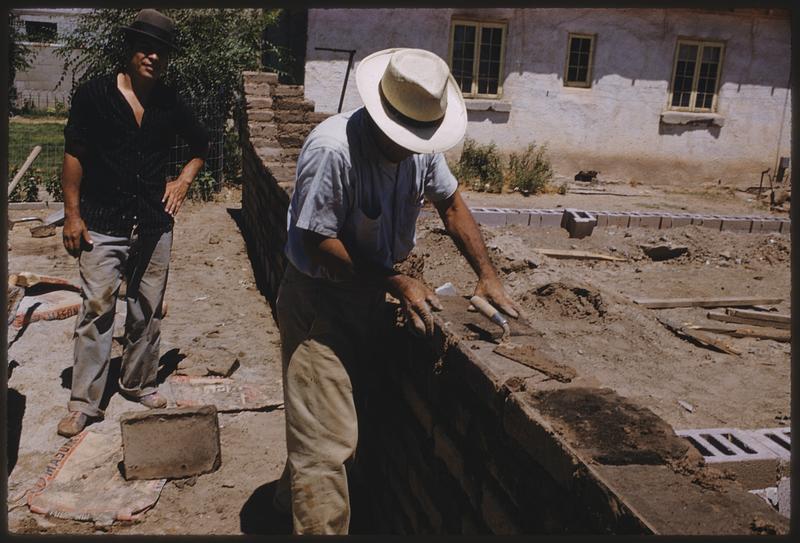 Men building wall, Albuquerque - Digital Commonwealth