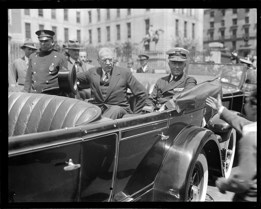 Richard E. Byrd and Mayor Frederick Mansfield in car in front of State ...