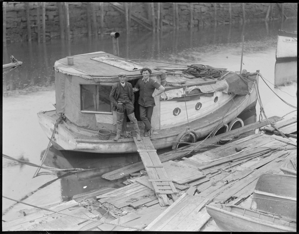 John Sullivan (R) on his unique houseboat Dawn. He lives year round in ...
