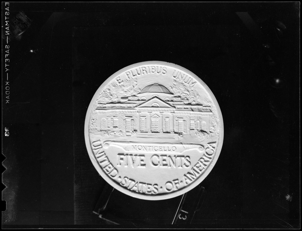 Photograph of both sides of a 1938 nickel - Digital Commonwealth