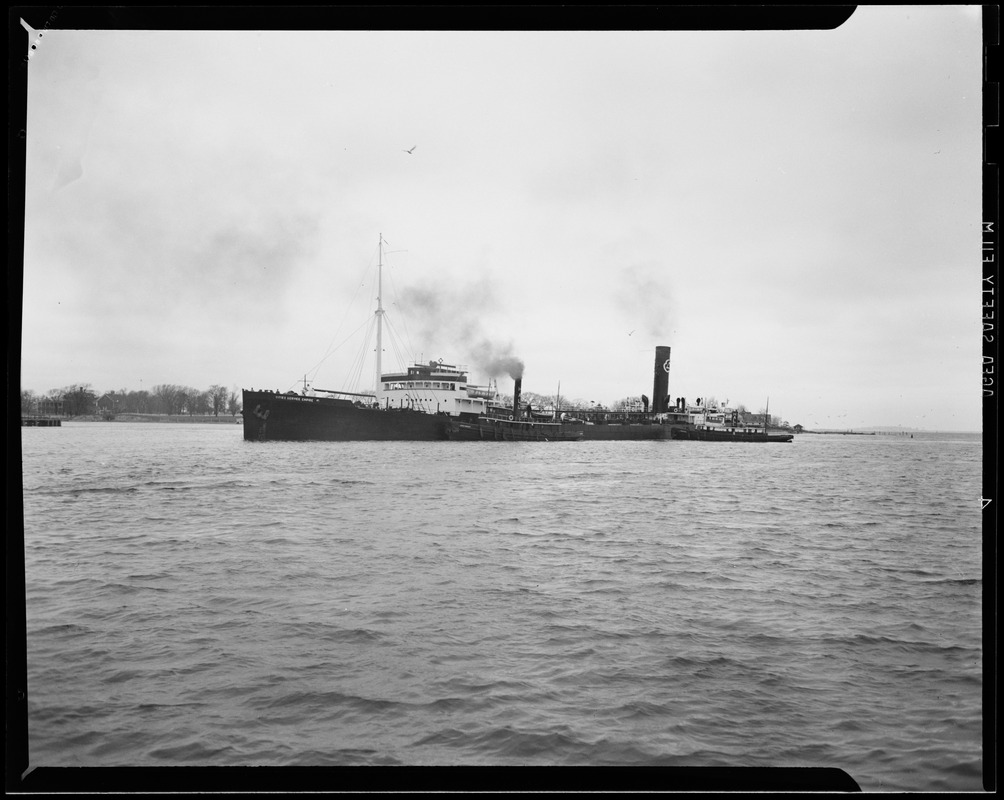 Hall tug docking tanker at Chelsea - Digital Commonwealth