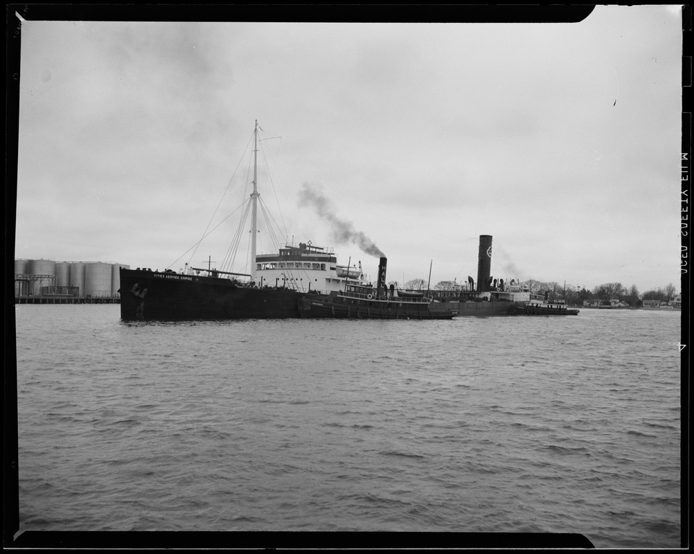 Hall tug docking tanker at Chelsea - Digital Commonwealth