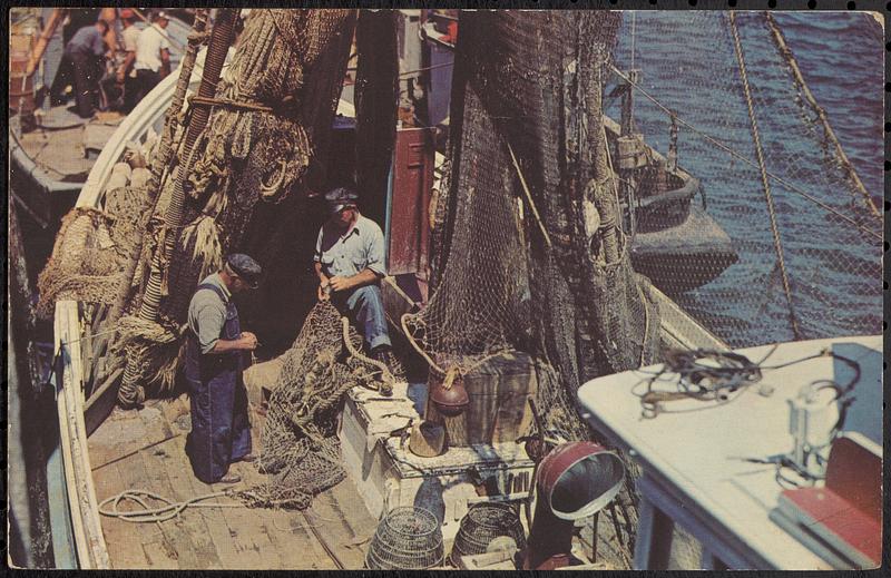 Mending nets aboard a Cape Cod fishing boat - Digital Commonwealth