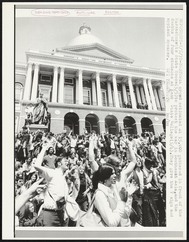 A crowd estimated at 15,000 gathered in front of the Massachusetts ...