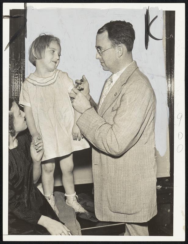 In Ware, Dr. Tracy L. Roberson is shown innoculating a young flood ...