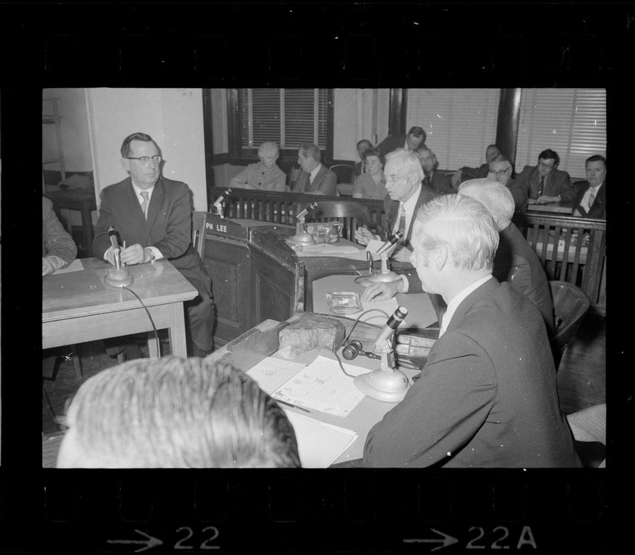 James W. Dailey, left, headmaster of English High School, appears ...