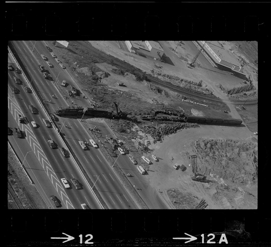 Runaway Penn Central locomotives block most of the Northbound lane of ...