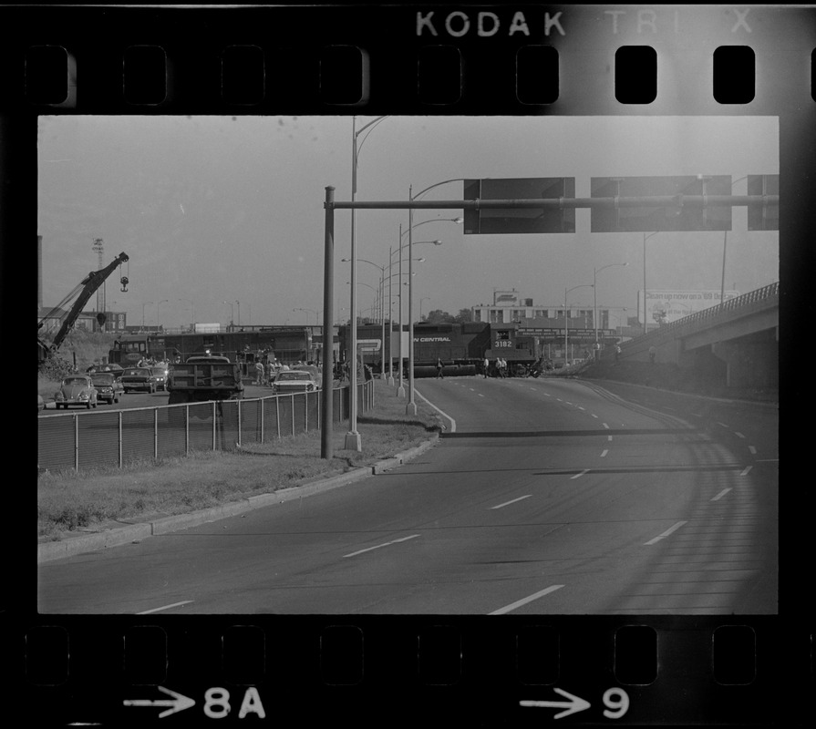Runaway Penn Central locomotives block most of the Northbound lane of ...