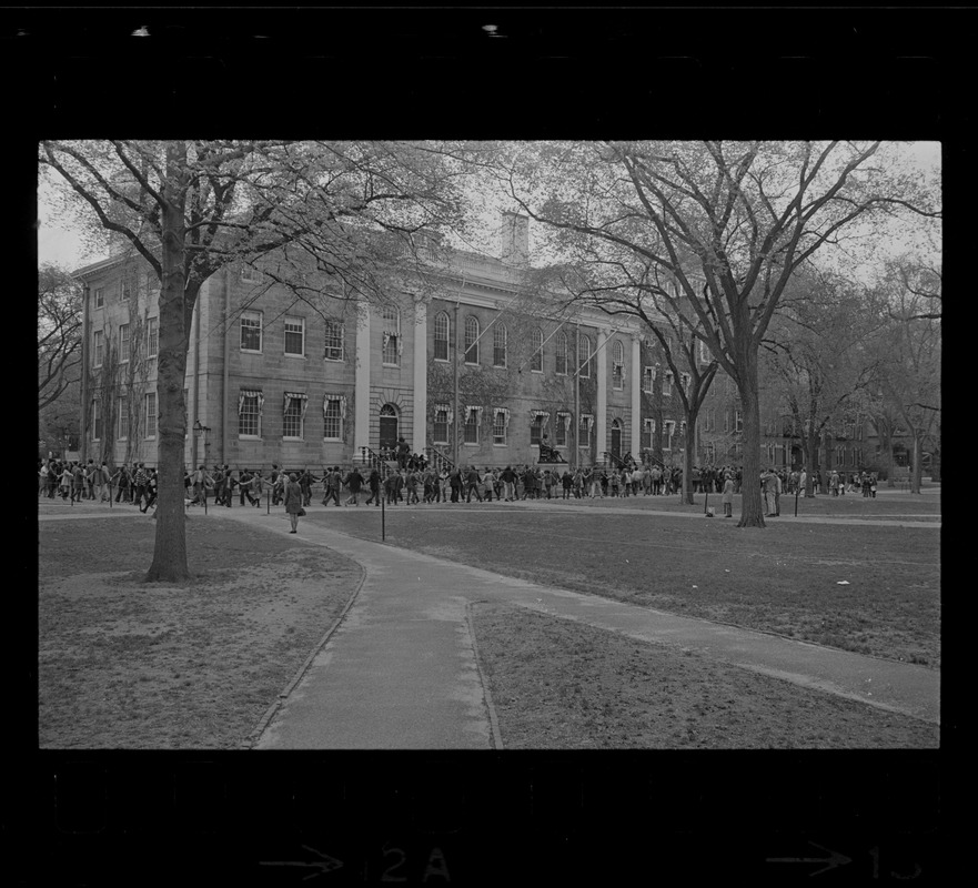 Harvard student protesters seen marching around University Hall ...