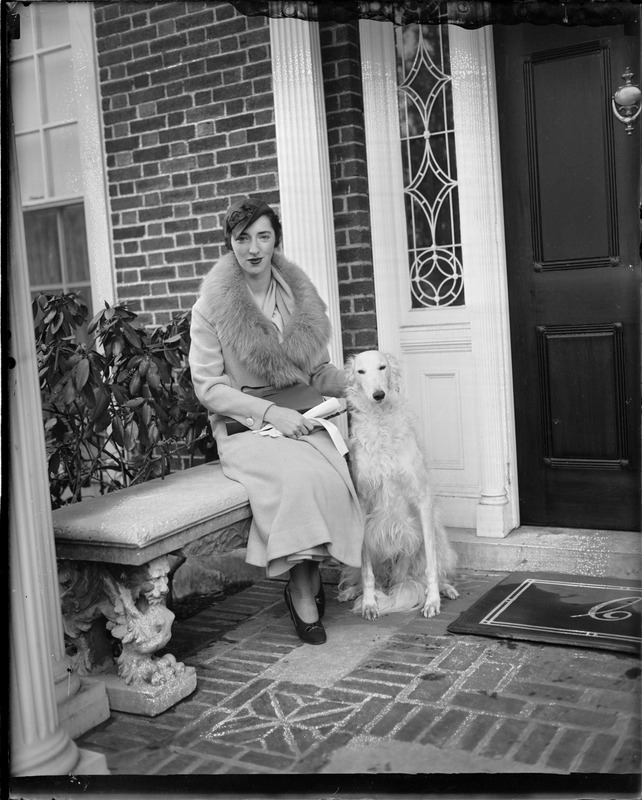 Miss Mary Curley with her dog on Easter Day. - Digital Commonwealth