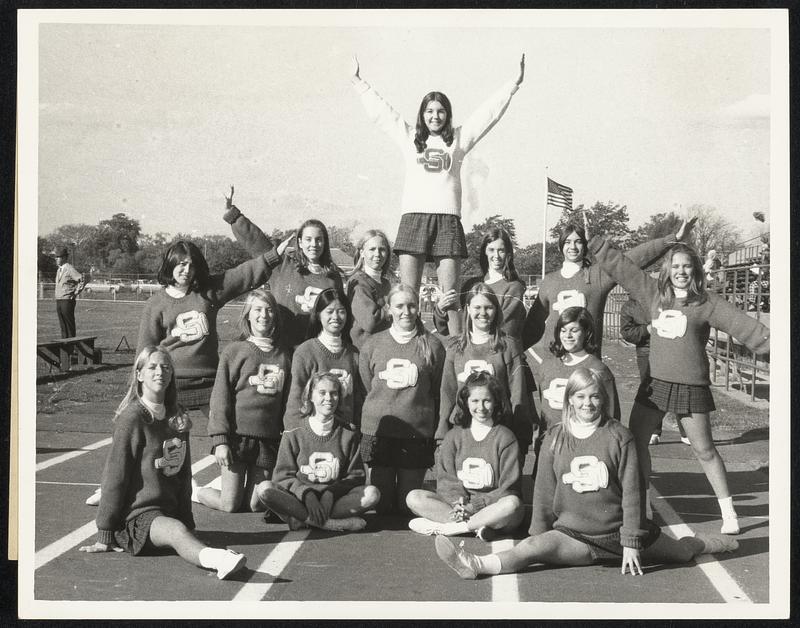 Bubbling Somerville High cheerleaders make like a pyramid to get their ...
