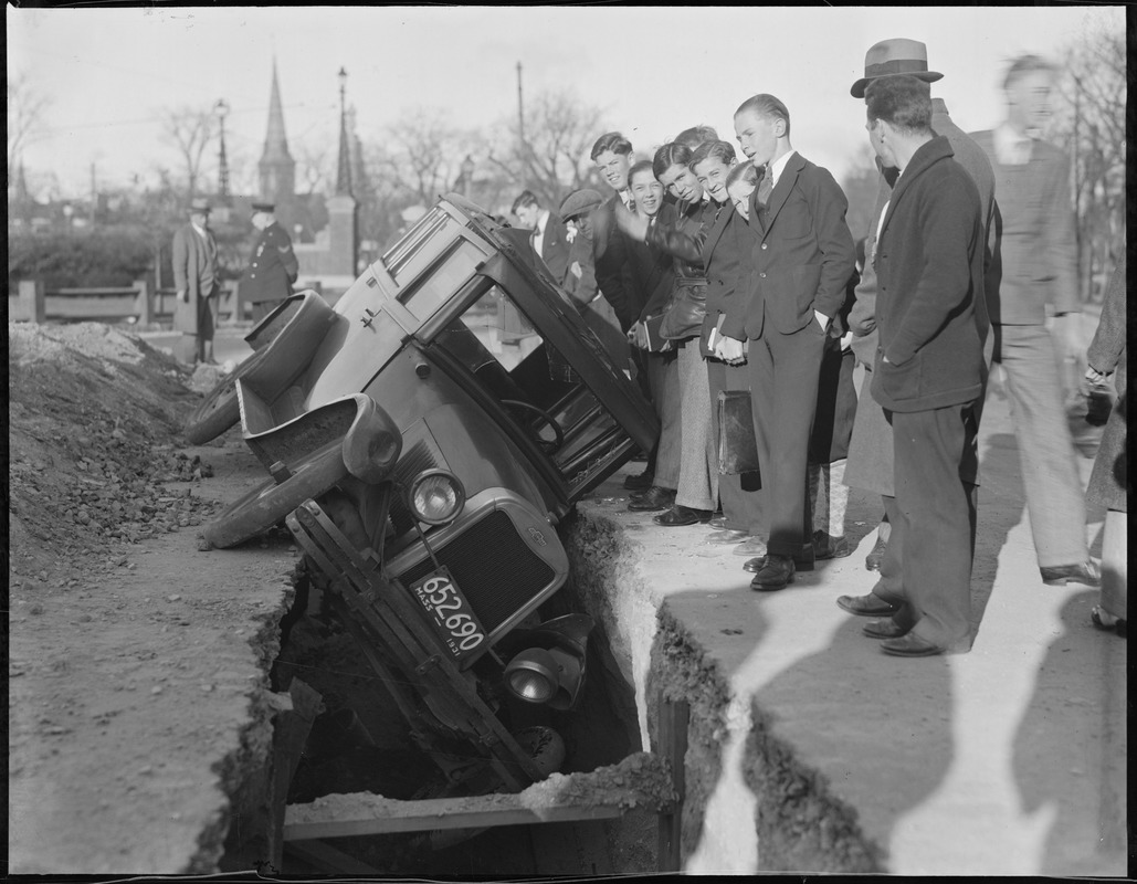 Auto goes into trench in Peabody Square - Digital Commonwealth