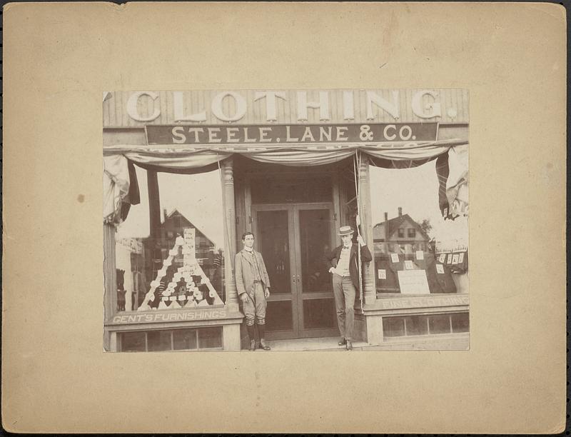 Men in front of Steele, Lane & Co. clothing store - Digital Commonwealth