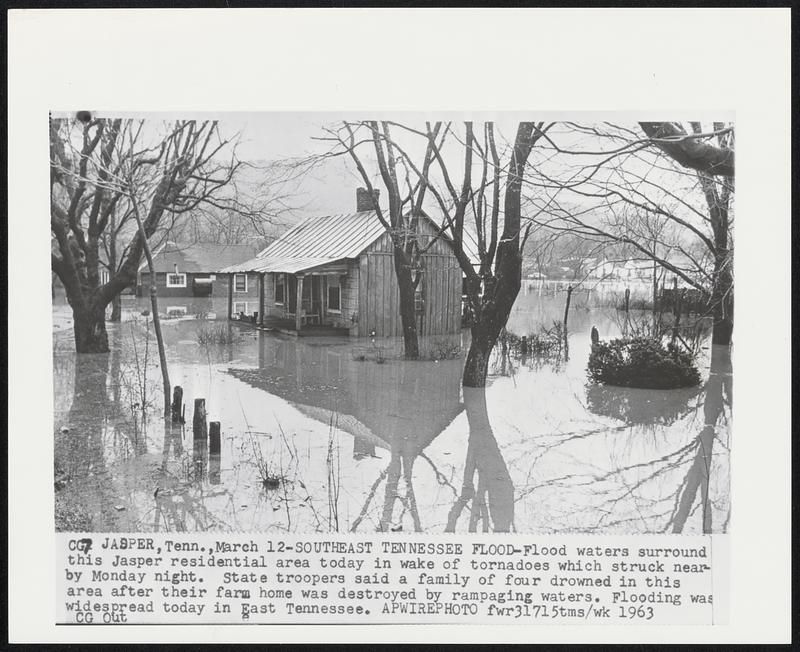 Southeast Tennessee Flood-Flood waters surround this Jasper residential ...