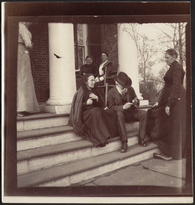 Joseph Randolph Coolidge sitting on front porch steps of Georgian-style ...