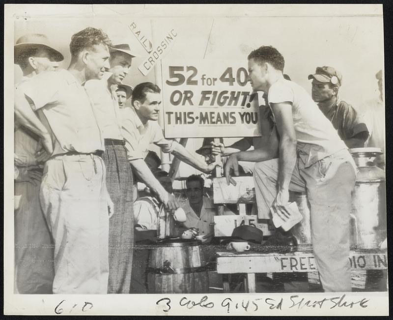 Pickets at Texaco Refinery-Vernon Do Jean, his foot on a bench, gives ...
