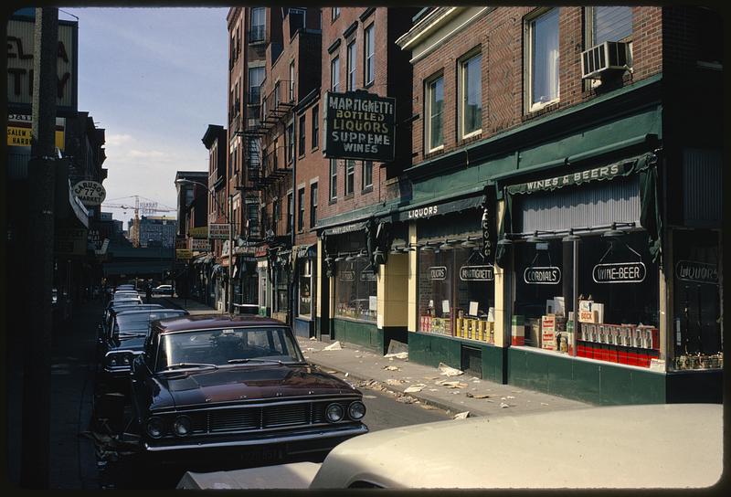 View down Salem Street with storefronts, Boston - Digital Commonwealth