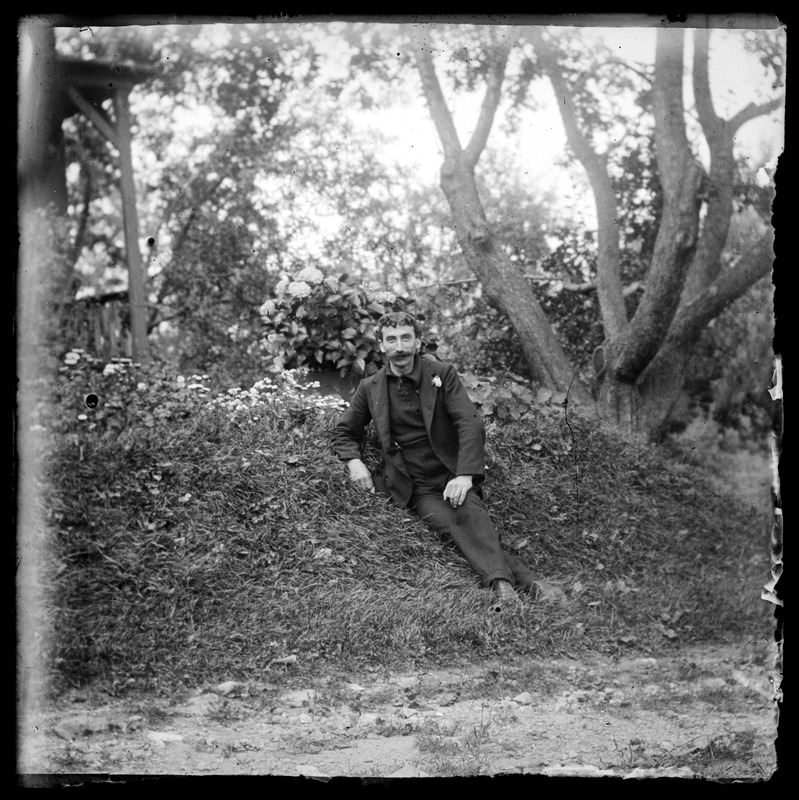 Augustus Martin reclining outdoors - Digital Commonwealth