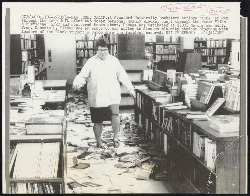 San Jose, Calif.: A Stanford University bookstore employe picks her way ...
