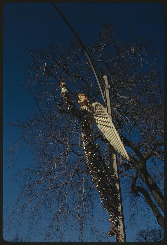 Angel decoration on light post - Digital Commonwealth