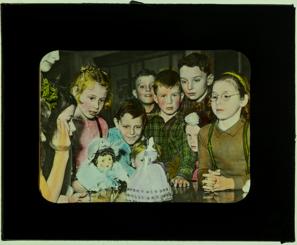 146 Christmas (1944) watching the mechanical doll - Digital Commonwealth