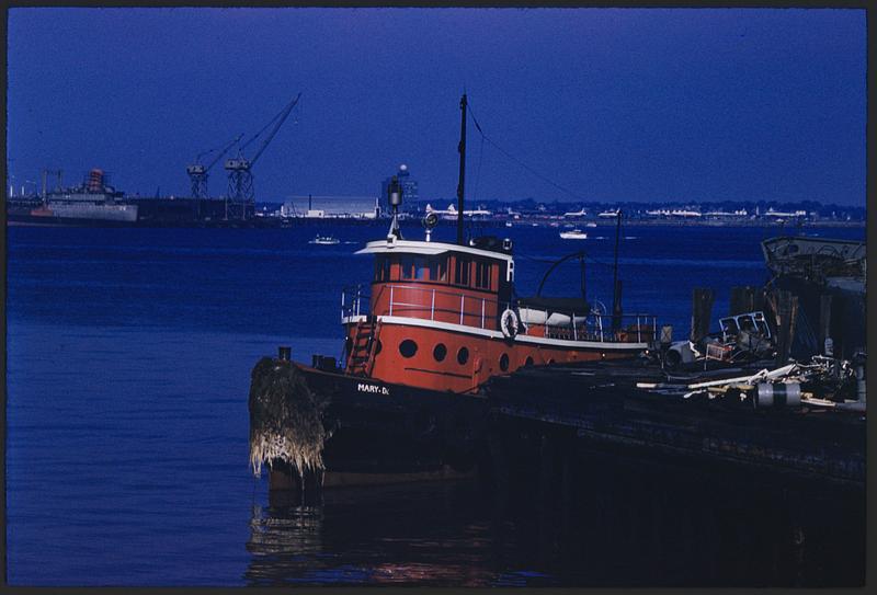 Red tugboat at dock, Boston Harbor - Digital Commonwealth