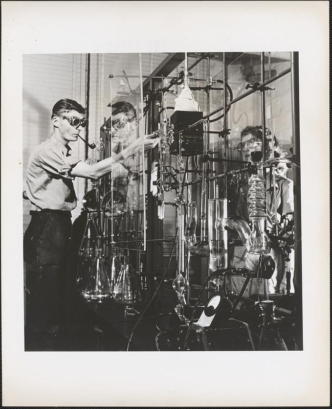 Exacting chemical reduction experiment occupies Shelby Walters, Naval ...