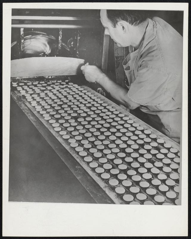 Sweet Stuff are these candy centers moving along a modern candy factory ...