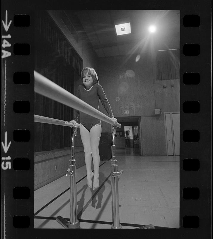 Bruce Irving's child doing gymnastics - Digital Commonwealth