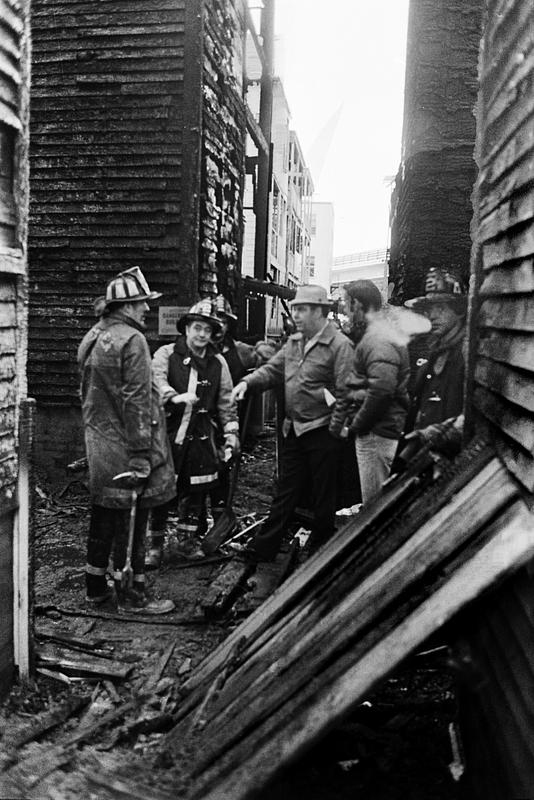 Left to right, Lt. Bill Daley, firefighter Tony Moschella, unknown ...