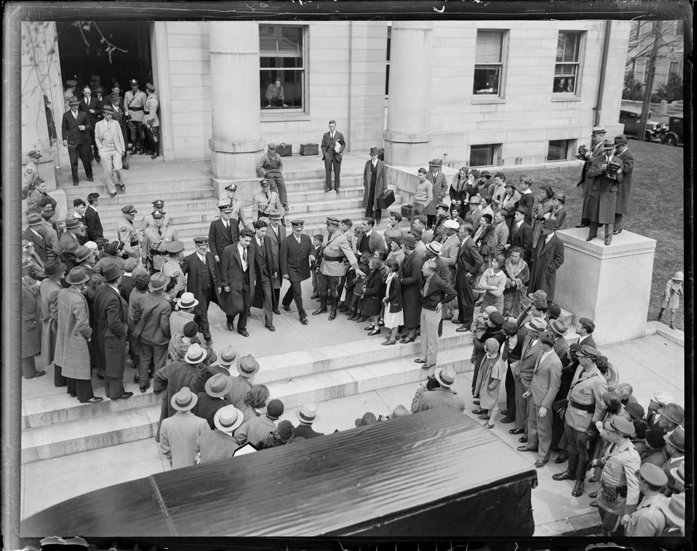 Millens and Faber coming out of Dedham court - Digital Commonwealth