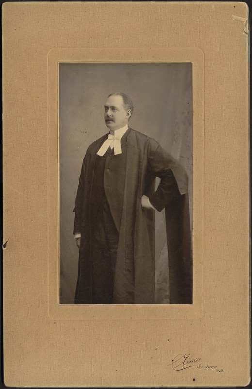 Man with mustache in judicial or academic robes, high collar and white ...