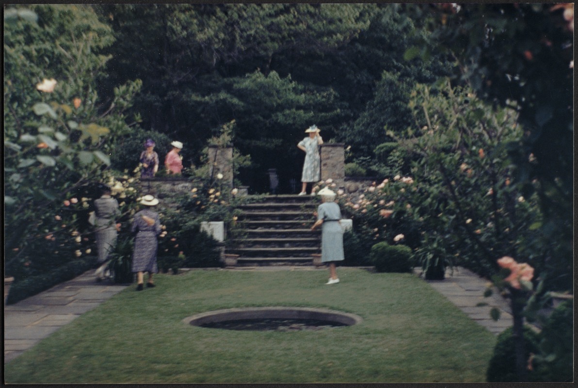 Ashdale Farm. View of Rose Garden in bloom; group of women near stairs ...