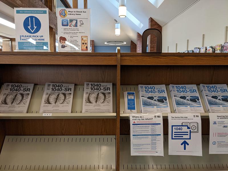 Shelves of tax return information - Digital Commonwealth