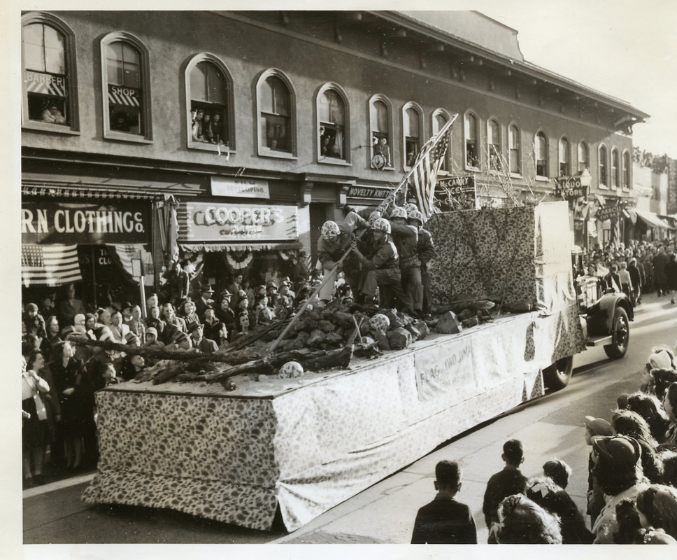 WWII victory parade, Main St., Iwo Jima float - Digital Commonwealth