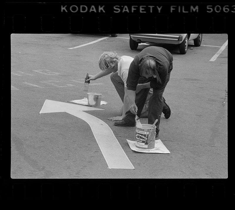 Workmen paint traffic direction arrow, Boston - Digital Commonwealth