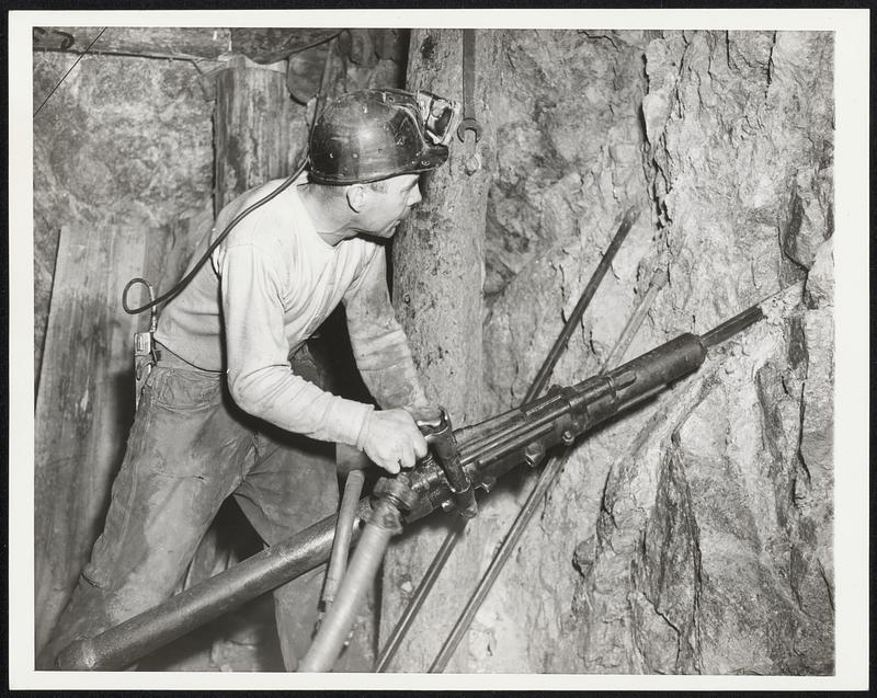 A Vital Wartime Metal - This industrial soldier is a hard rock miner ...