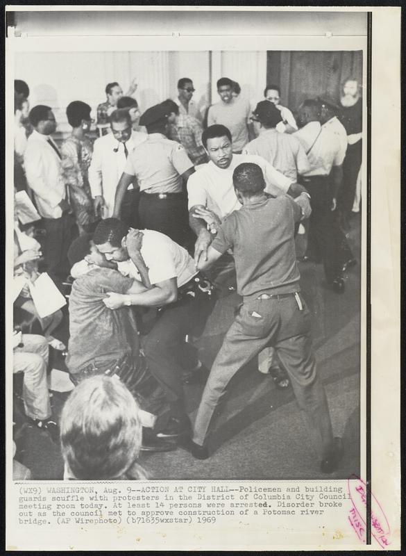 Action at City Hall--Policemen and building guards scuffle with ...