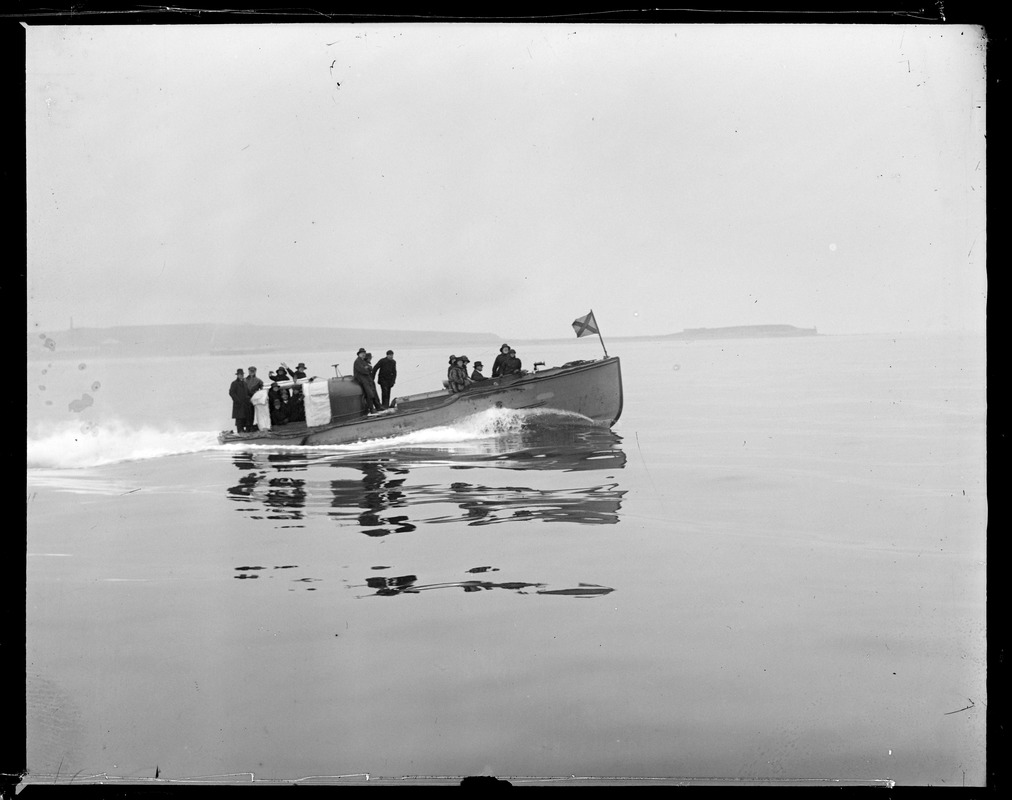 Motor boat speeding down the Harbor to get in view of the troop ships ...