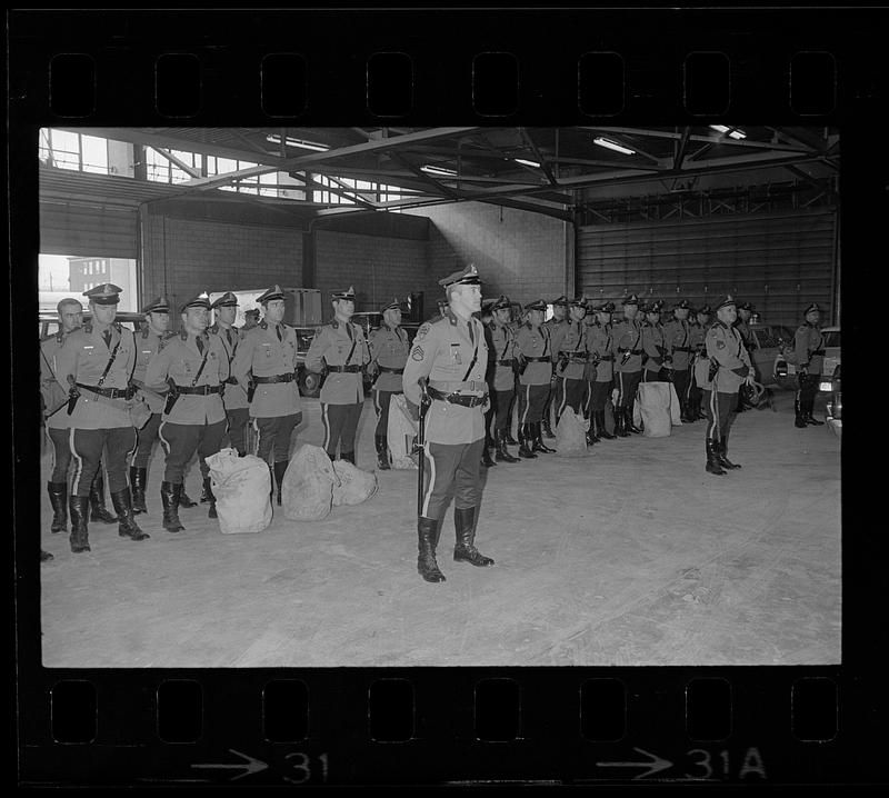 Earth Day demonstration: State Police in riot equipment, Logan Airport ...