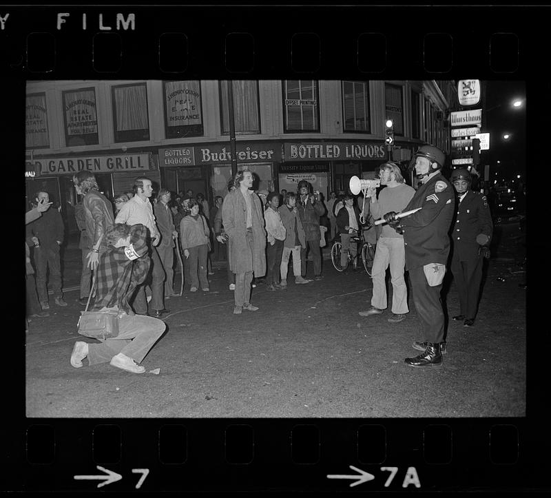 Harvard Square anti-war riot: Demonstrator urges calm with a bullhorn ...