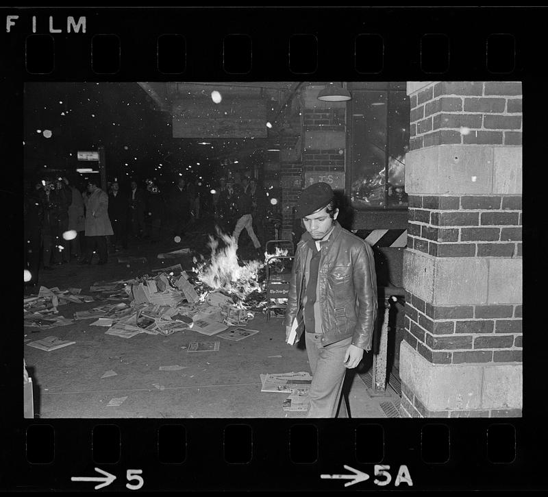 Harvard Square anti-war riot: Burning newspapers at subway kiosk ...