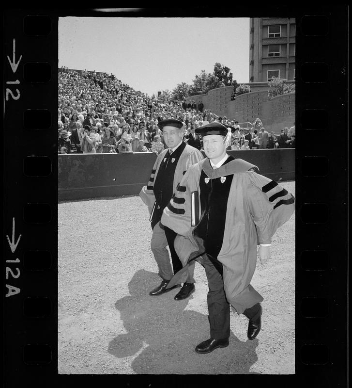 Boston University president John Silber (right) in graduation exercises ...