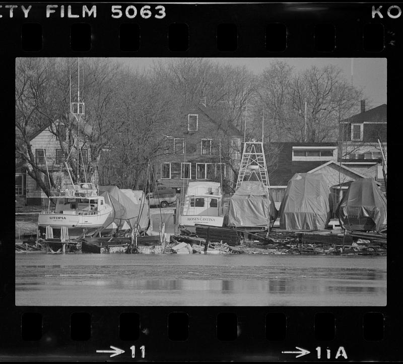 Boats on land along the water - Digital Commonwealth