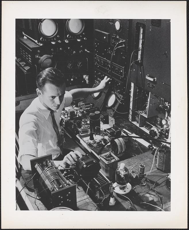 A radio engineer conducting a 'breadboard' experiment - Digital ...