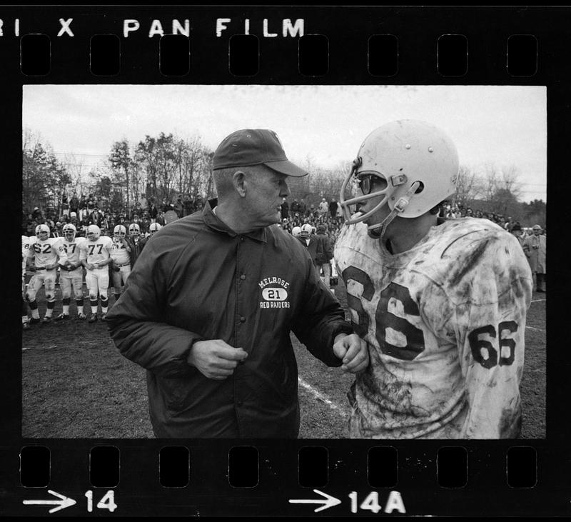 Coach and player at high school football game, Melrose, MA - Digital ...