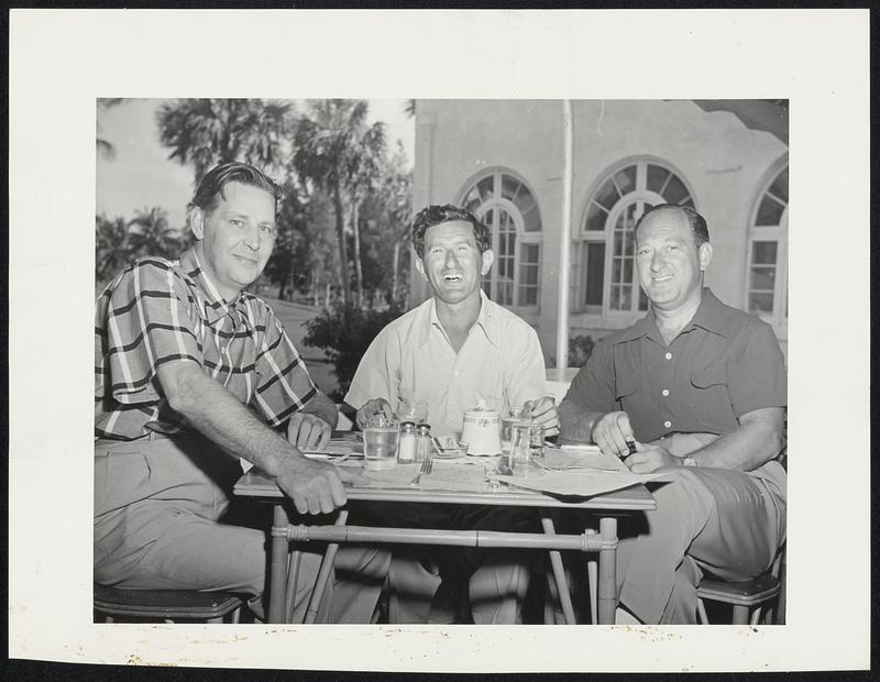 Secretary of Labor Maurice Tobin (left) is shown having lunch at the ...