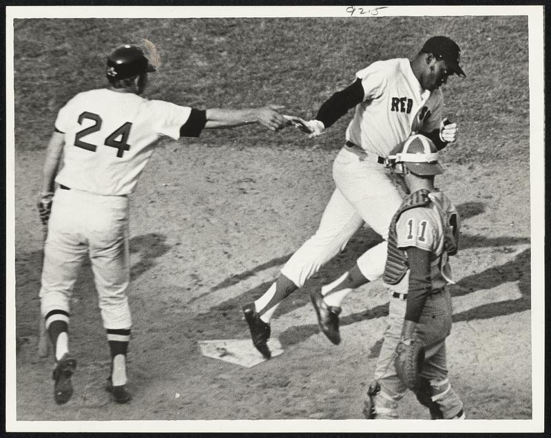 The Winner - George Scott accepts congratulations from on-deck batter ...