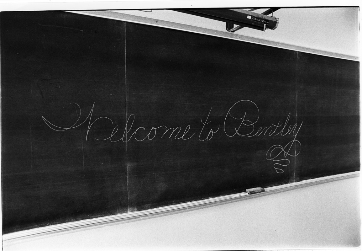 "Welcome to Bentley" sign on chalkboard - Digital Commonwealth