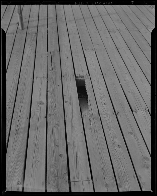 Damaged plank on roof deck - Digital Commonwealth